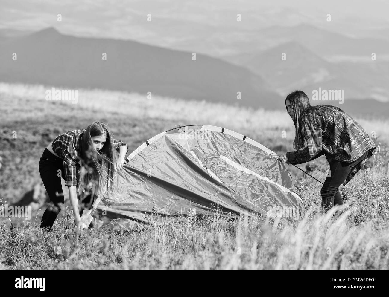 Camping trip. Helpful to have partner for raising tent. Camping skills ...