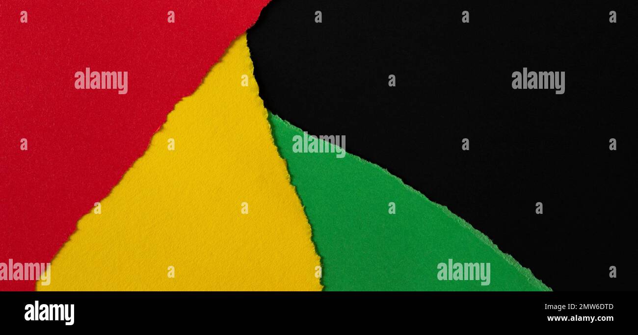 Abstract geometric black, red, yellow, green color paper background ...