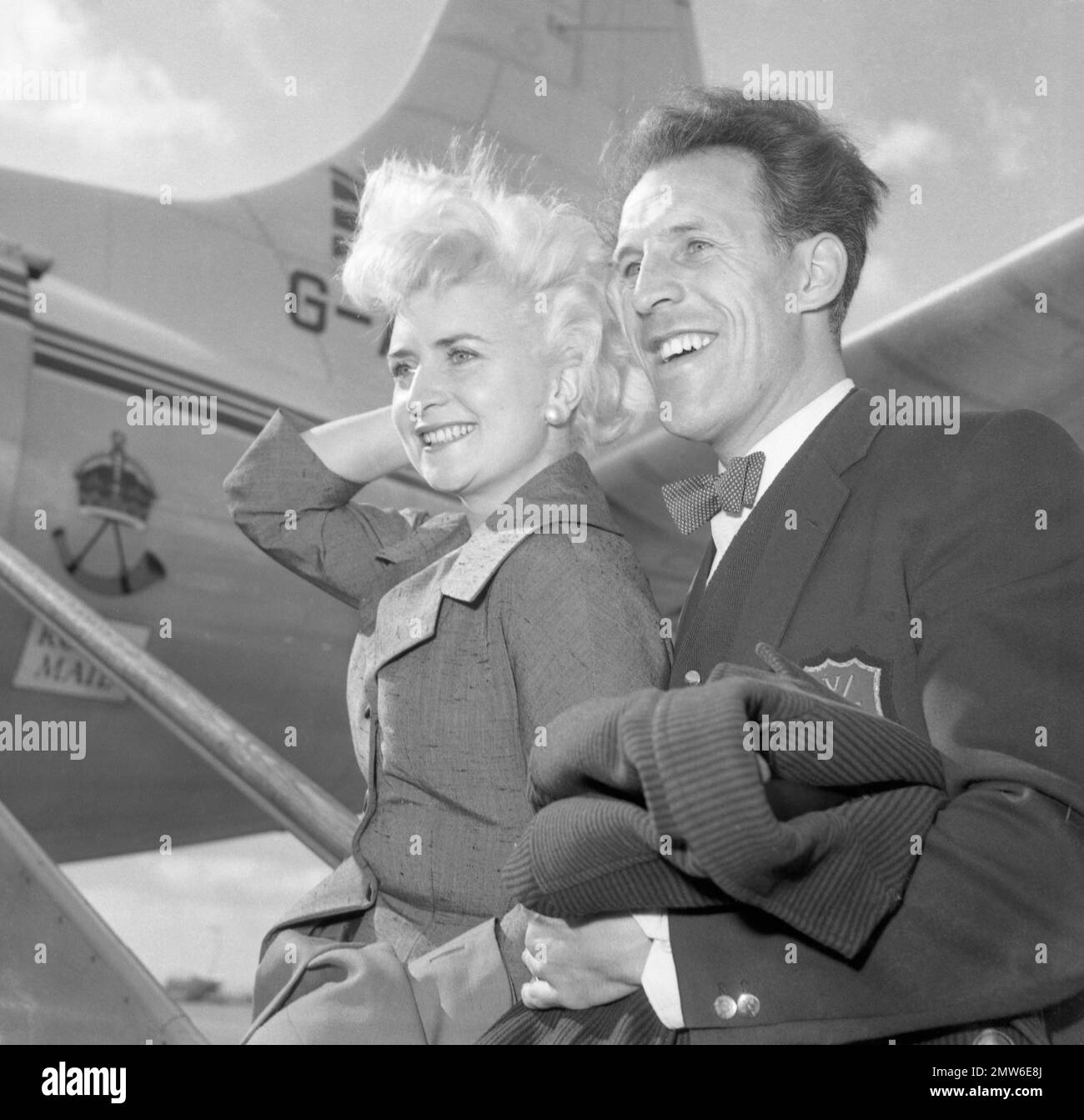 Comedian Bruce Forsyth and his wife Penny boarding an aircraft at ...