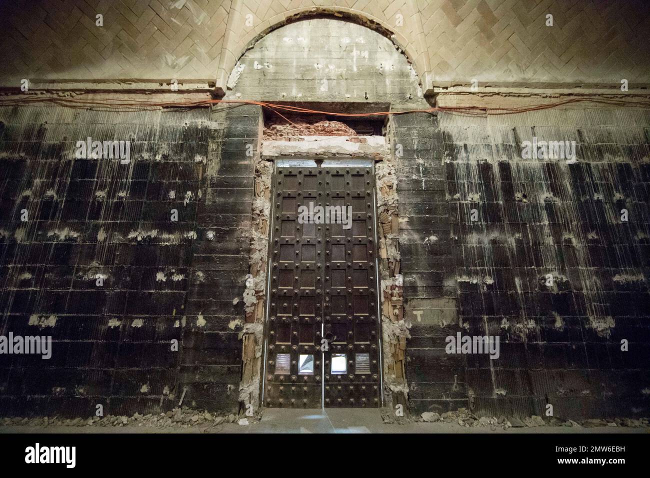 A set of doors are shown in the vaulted walkway after a groundbreaking ...