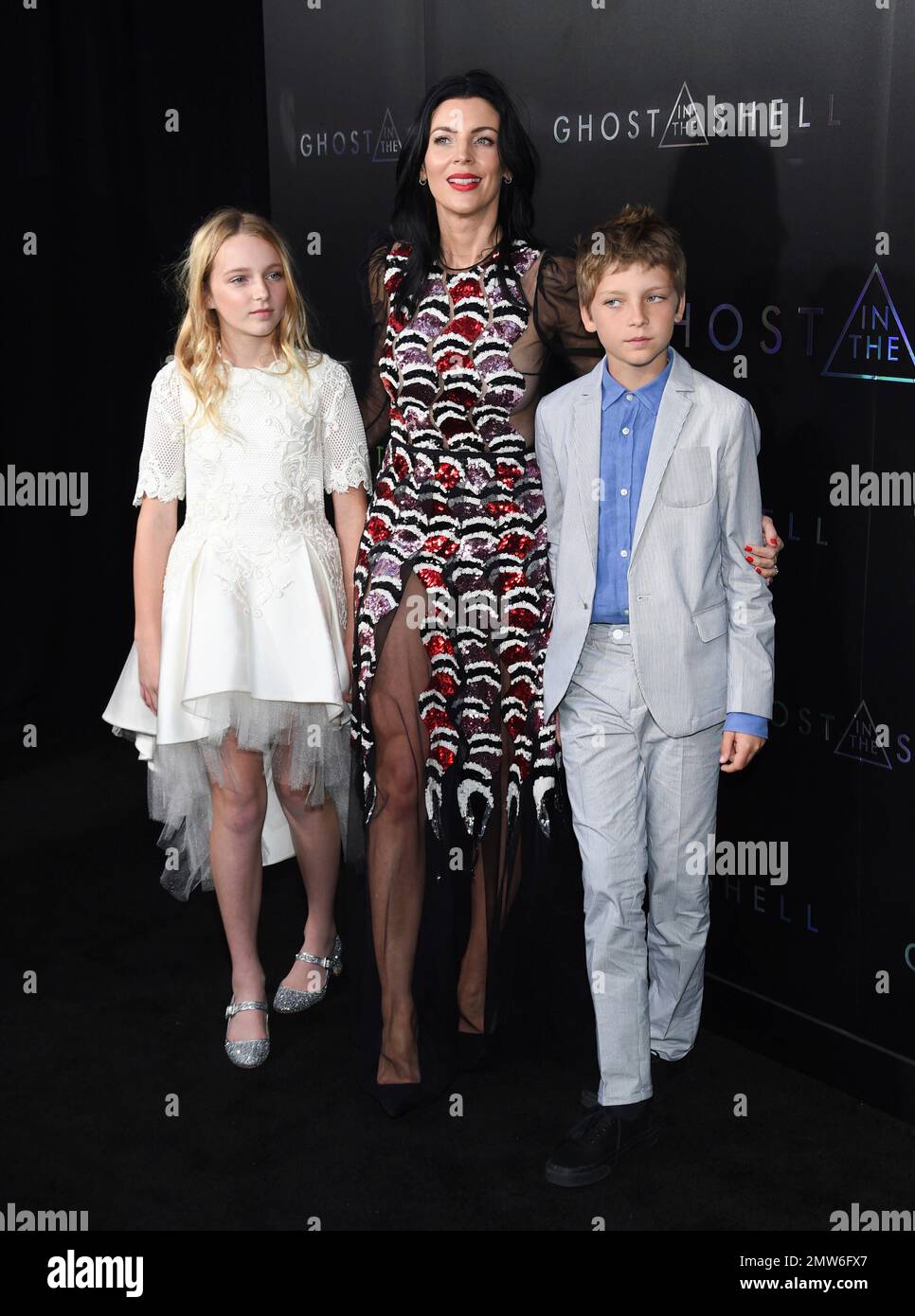 Model Liberty Ross poses with her children Skyla Sanders, left, and ...