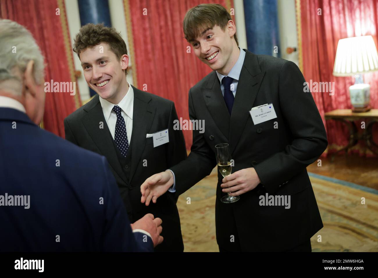King Charles III meets Oliver Kendal and Joshua Carrot during a ...