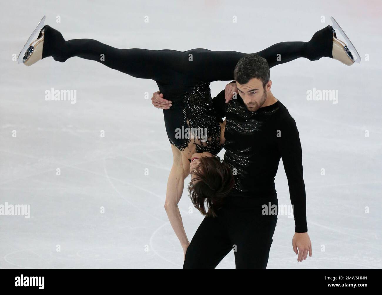 Meagan Duhamel and Eric Radford, of Canada, skate their short program ...
