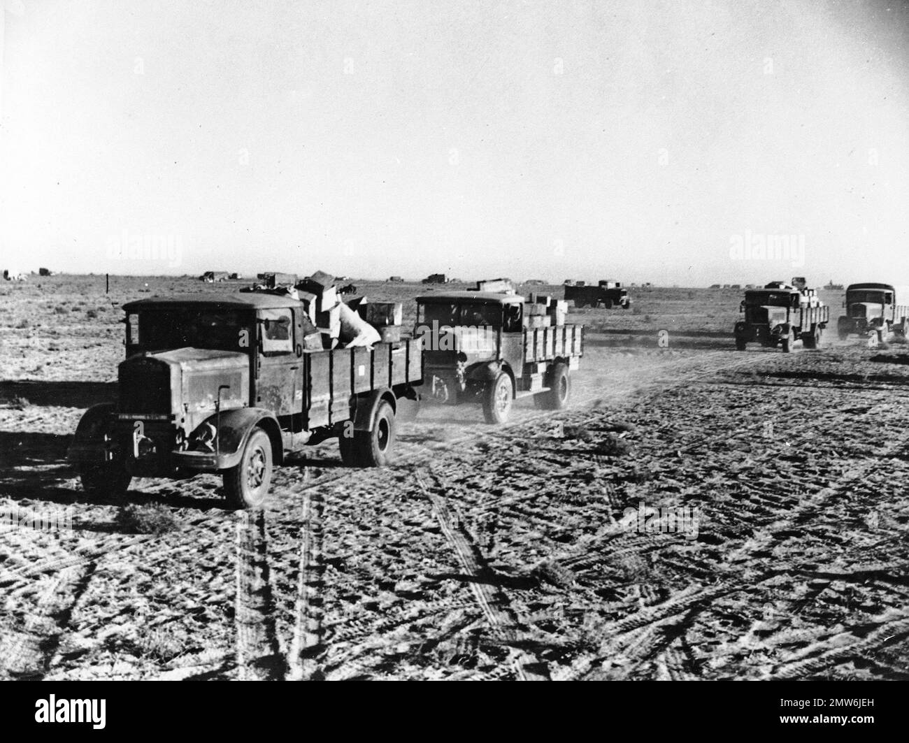Italian trucks loaded with food supplies roll across the sands ...