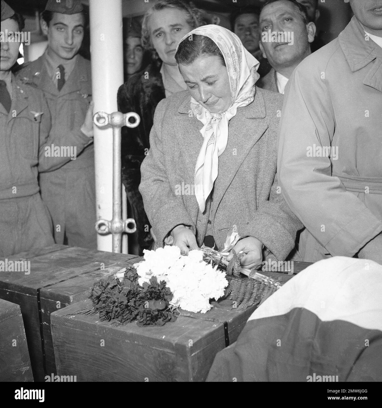 Maria Toffano Cavaliere of Venice, weeps looking at the coffin of her ...