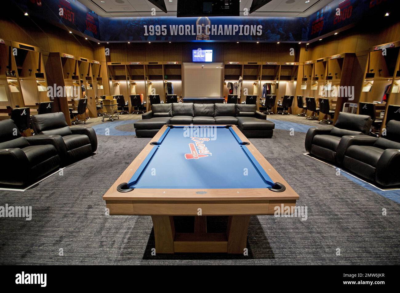 A pool table sits in the middle of the clubhouse at SunTrust Park, the ...