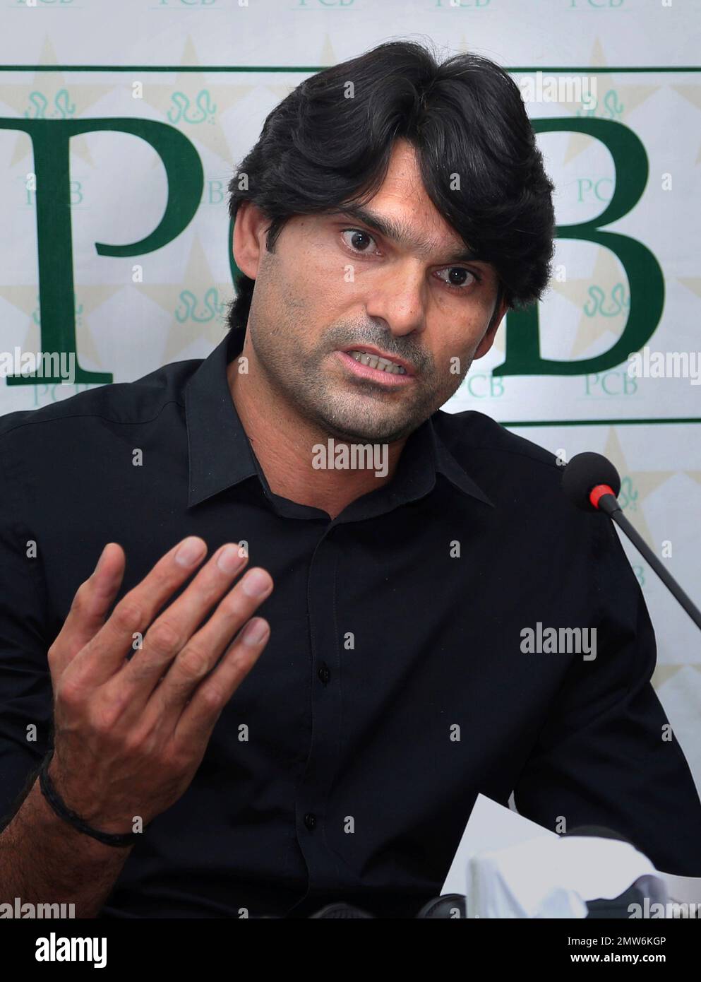 Pakistani cricketer Mohammad Irfan speaks during a press conference in ...