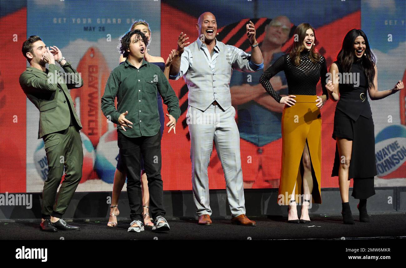 "Baywatch" cast members Zac Efron, from left, Jon Bass, Dwayne Johnson ...