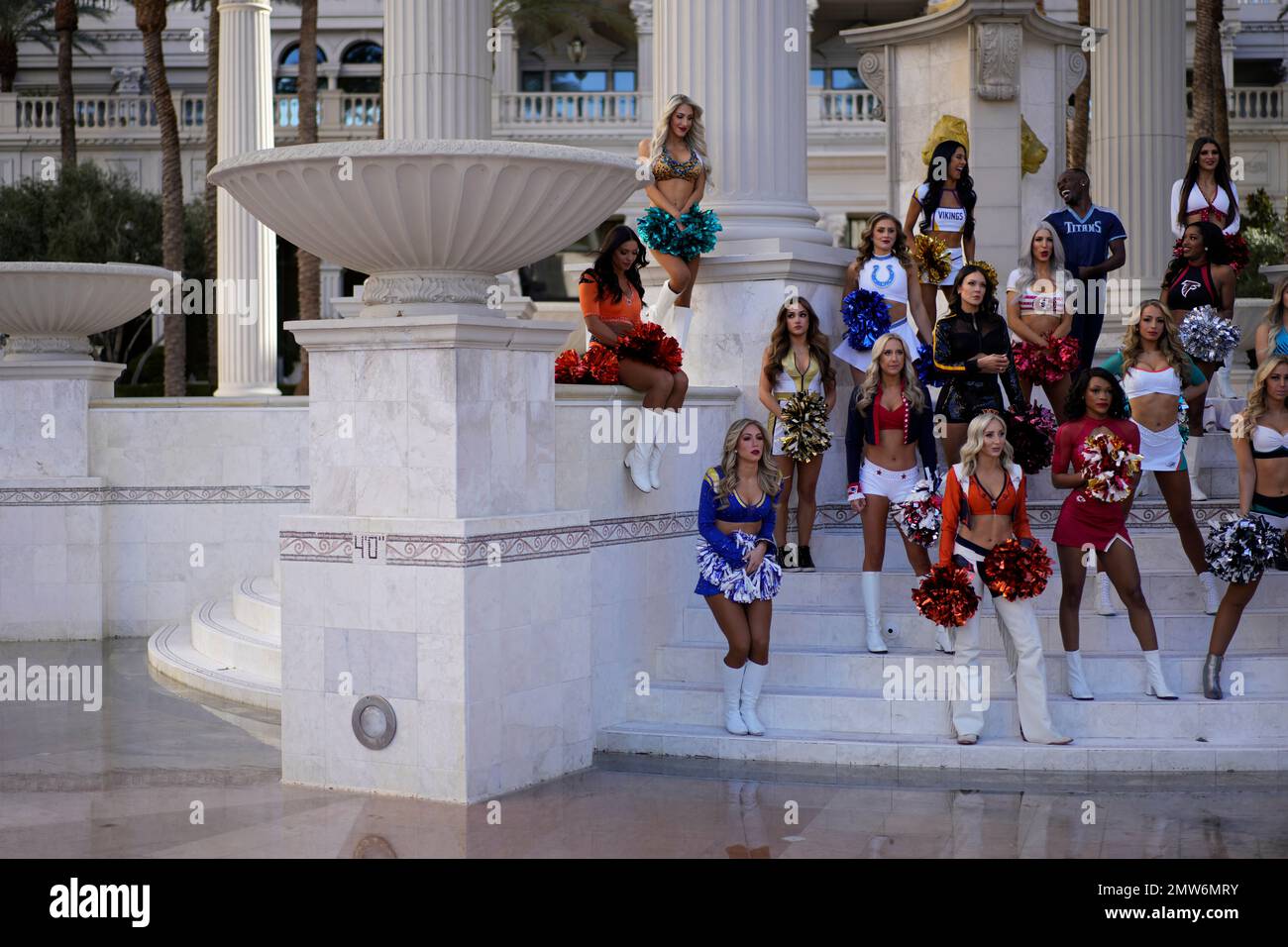 NFL Pro Bowl cheerleaders wait during a break in group photo session ...