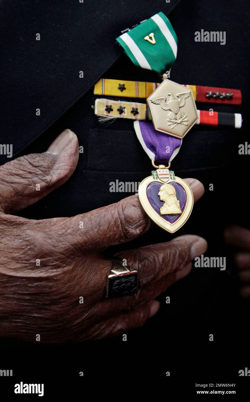 FILE - In this Jan. 17, 2012 file photo, Carl Clark, 95, shows off the ...