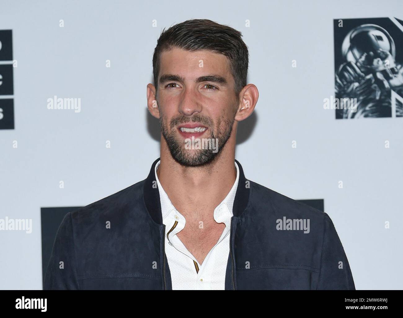 FILe - In this Aug. 28, 2016 file photo, Michael Phelps poses in the ...