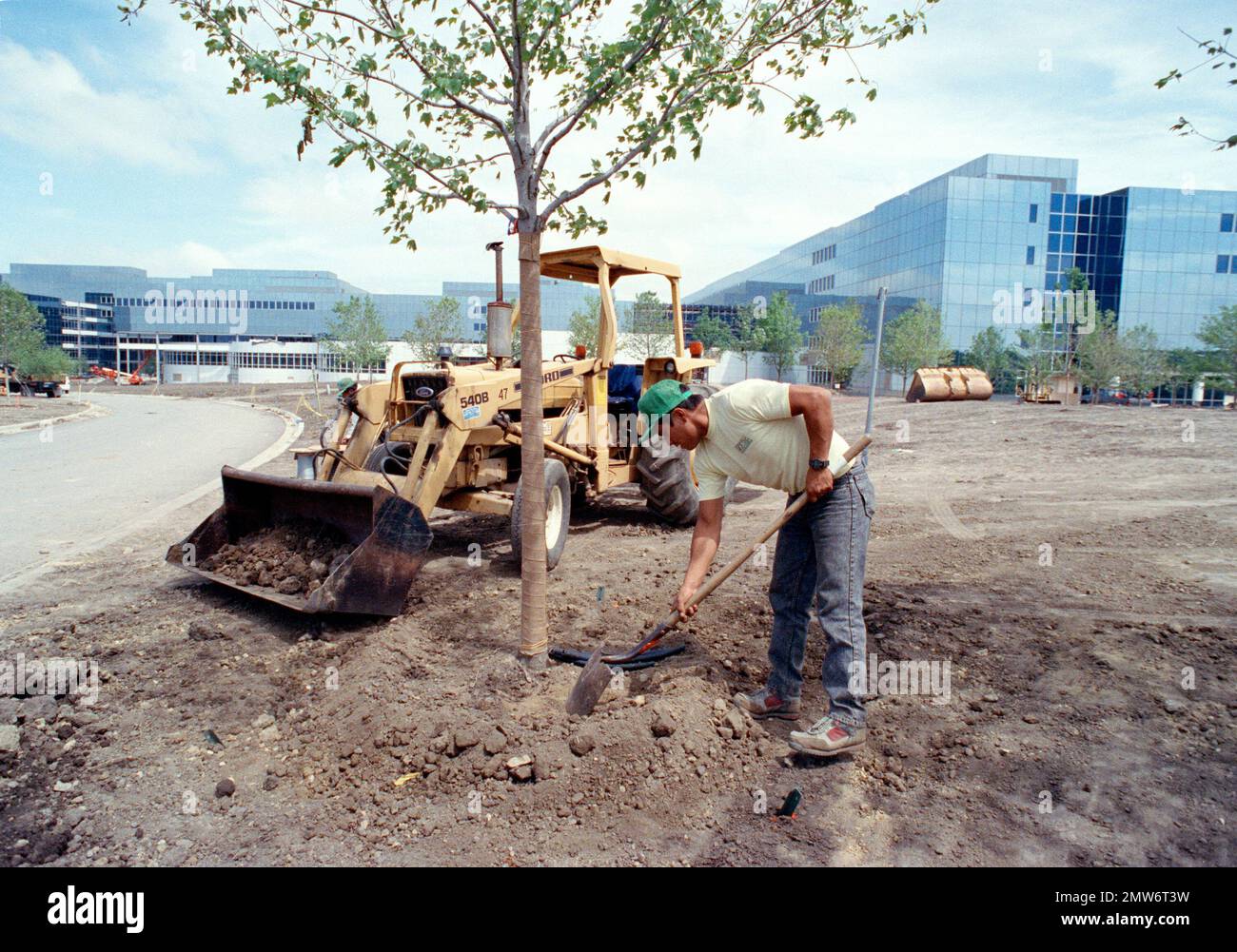 Construction workers put finishing touches on the exterior at Prairie ...