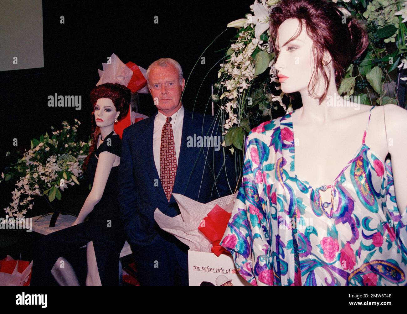 Arthur C. Martinez, chairman of Sears merchandise group, stands between ...