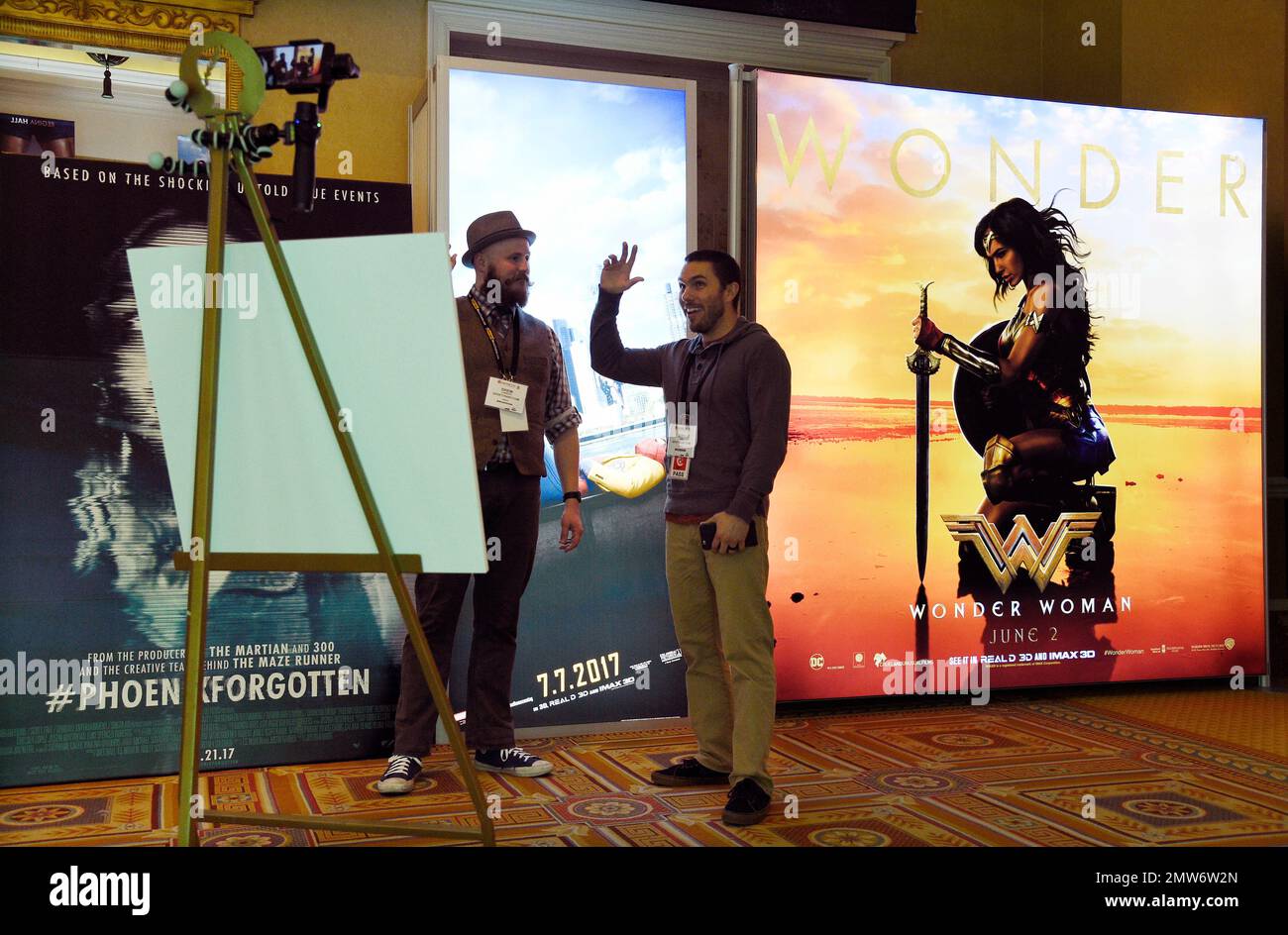 Drew Lawrence, left, and Joey Paur film a segment for their web show ...