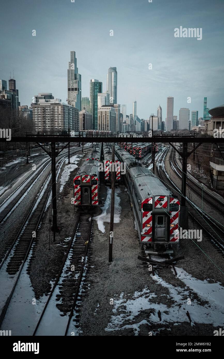 A vertical of trains parked on the railroad tracks against the skyline ...