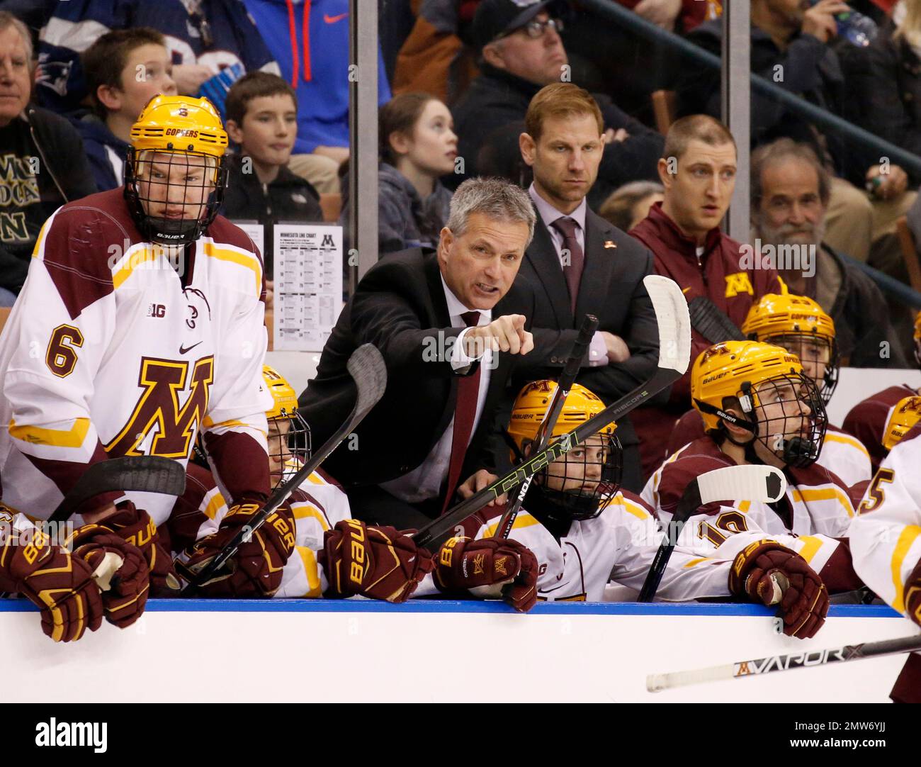 Minnesota head coach Don Lucia coaches his team during the first period ...