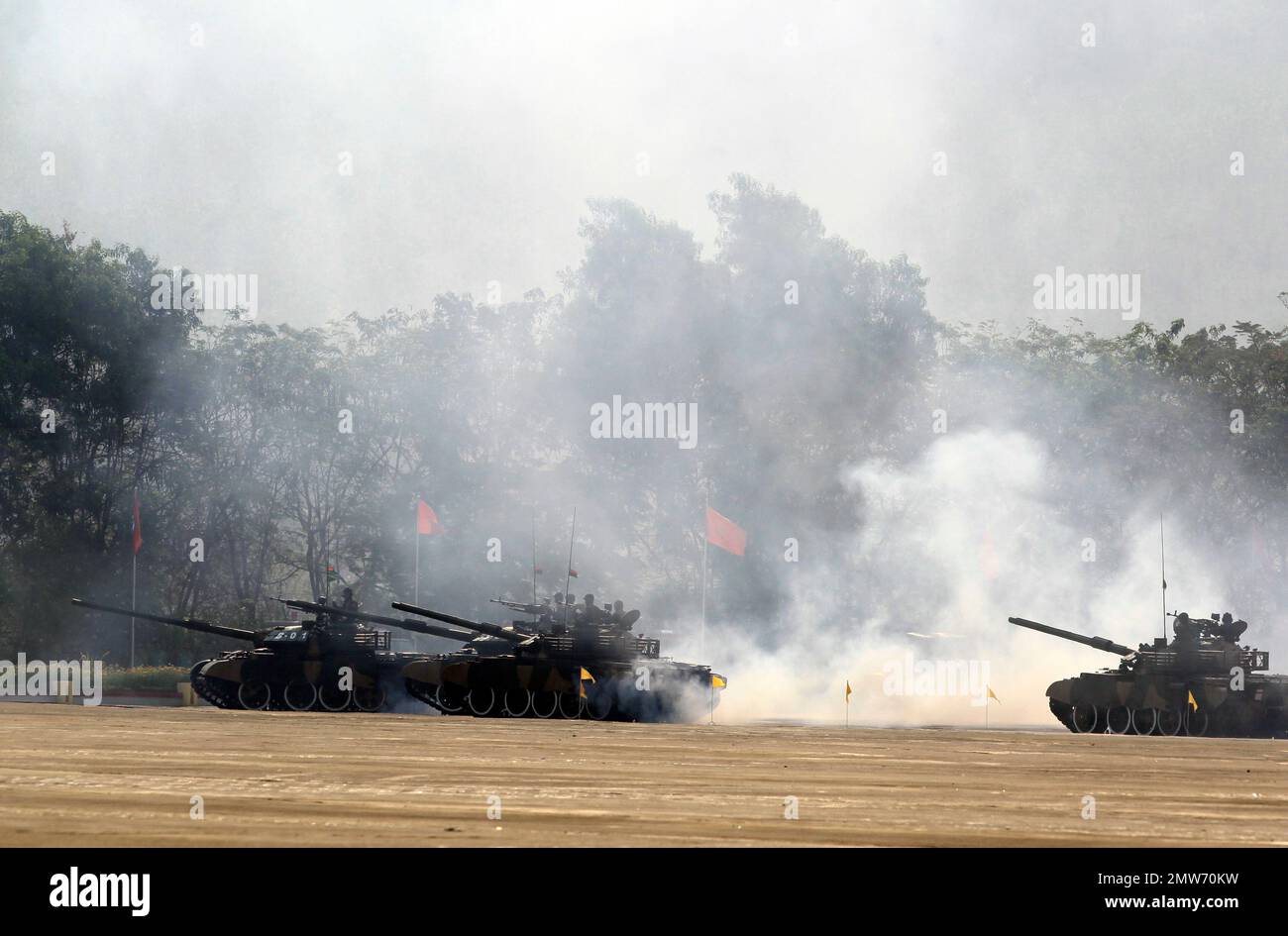 Myanmar military armed-tanks are driven during a parade to commemorate ...