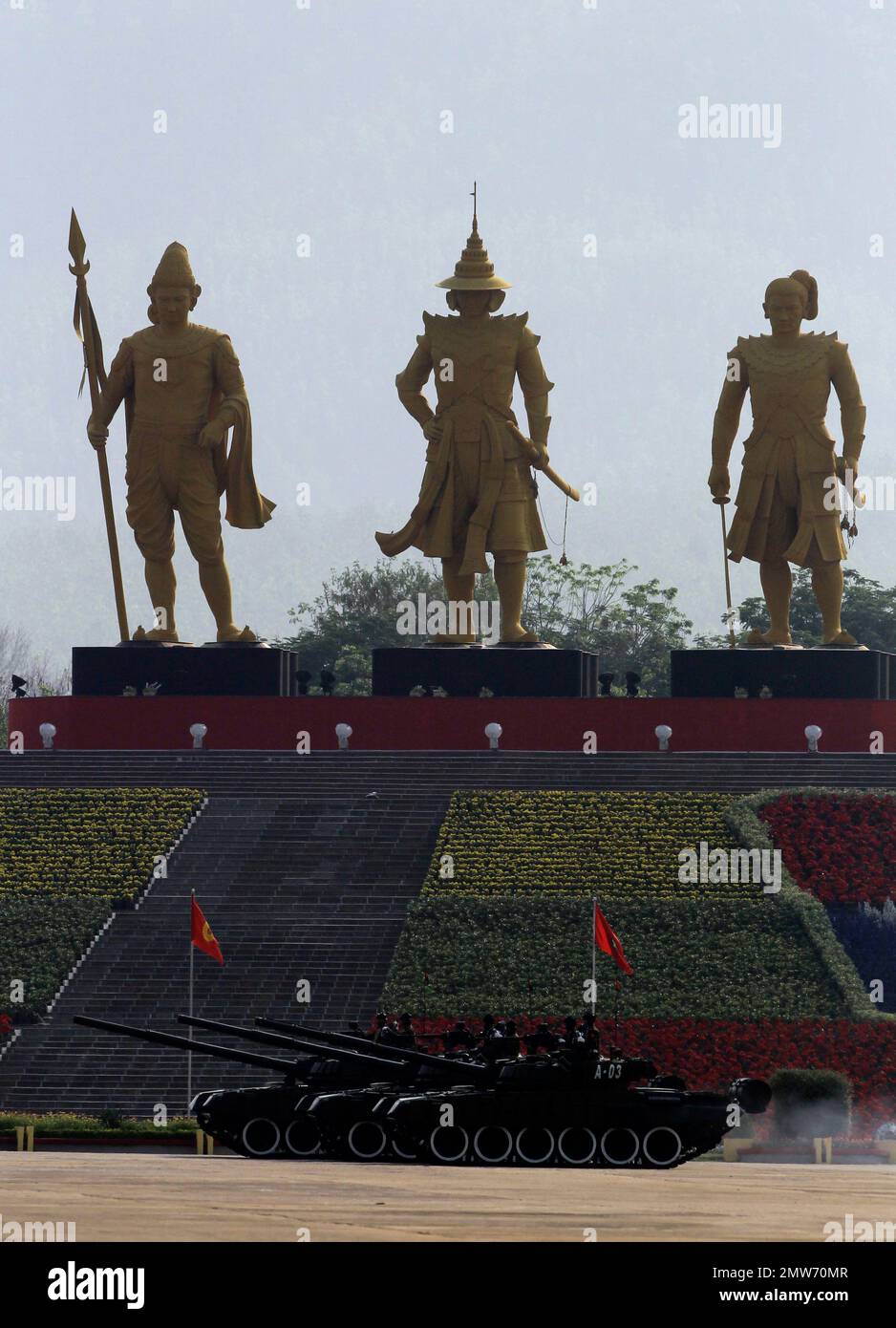 Myanmar military armed-tanks are driven during a parade to commemorate ...