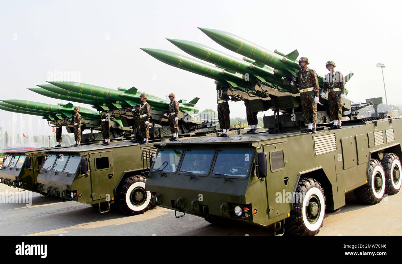 Myanmar's military officers atop trucks loaded with missiles as they ...