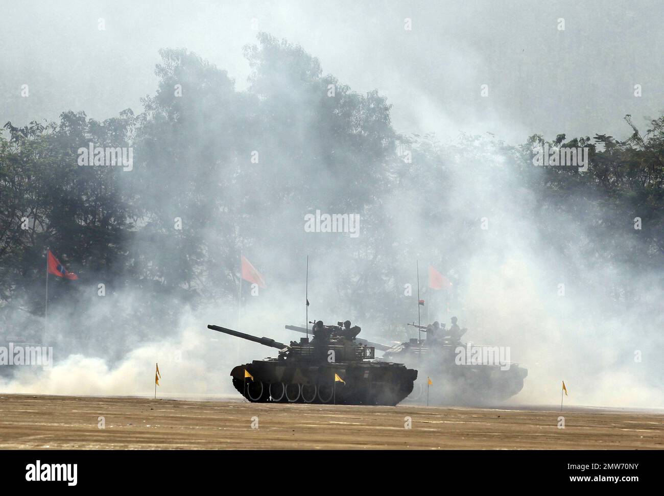 Myanmar military armed-tanks are driven during a parade to commemorate ...