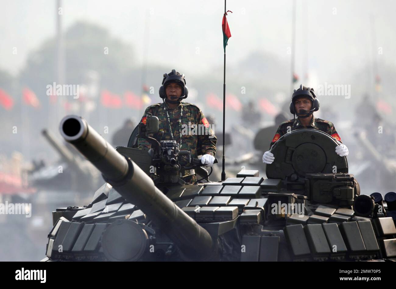 Myanmar military armed-tanks are driven during a parade to commemorate ...
