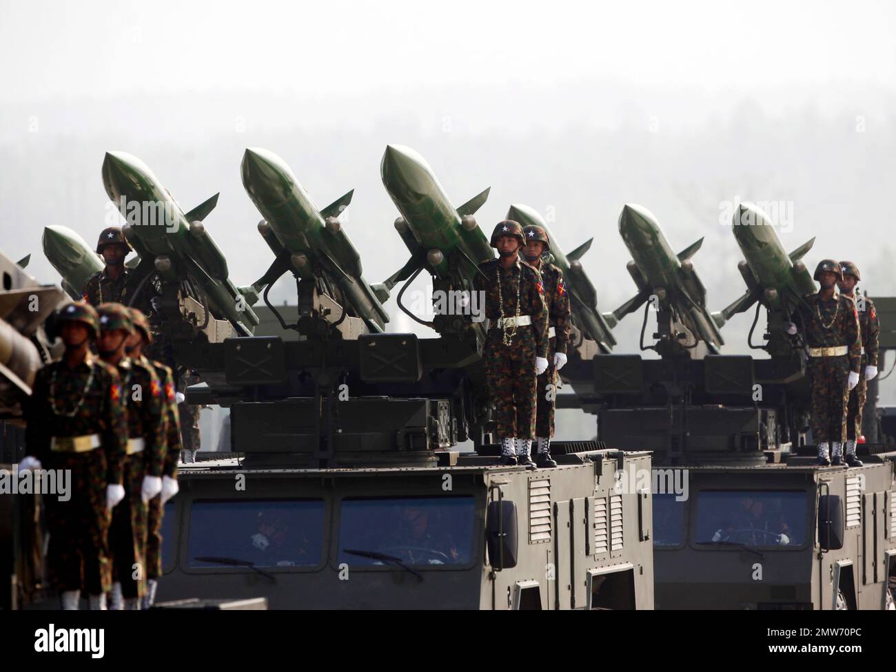 Myanmar military officers leave the venue during a parade to ...