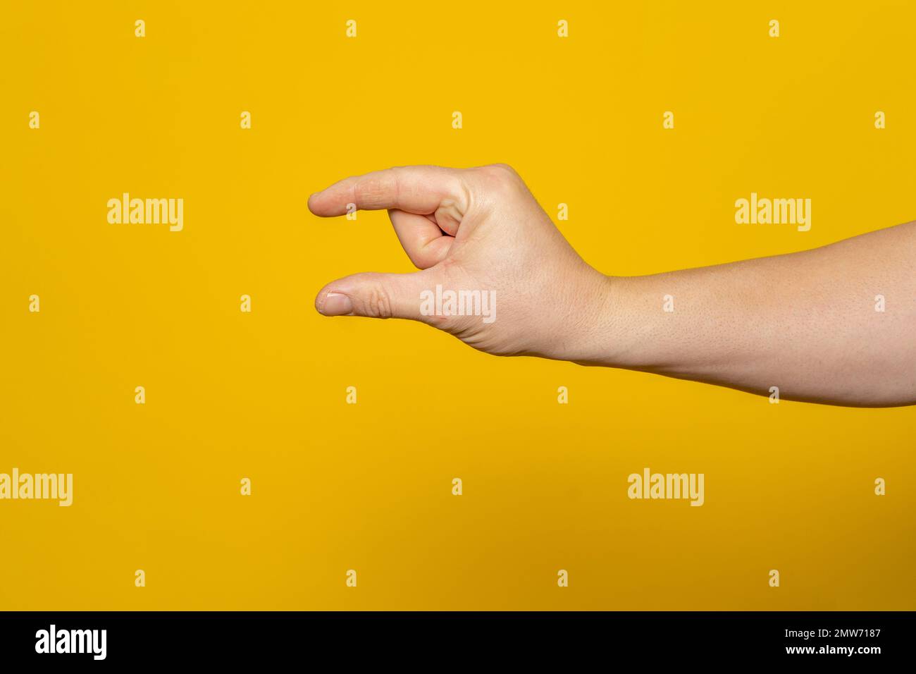 Showing large size hand gesture hi-res stock photography and images - Alamy