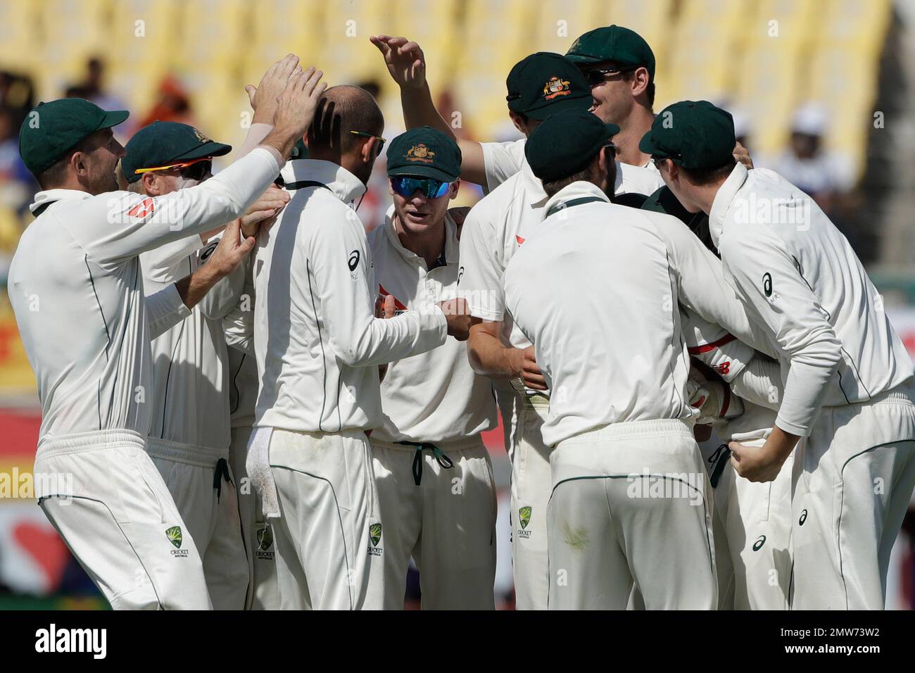 Australia's captain Steven Smith, center, and team celebrates the ...