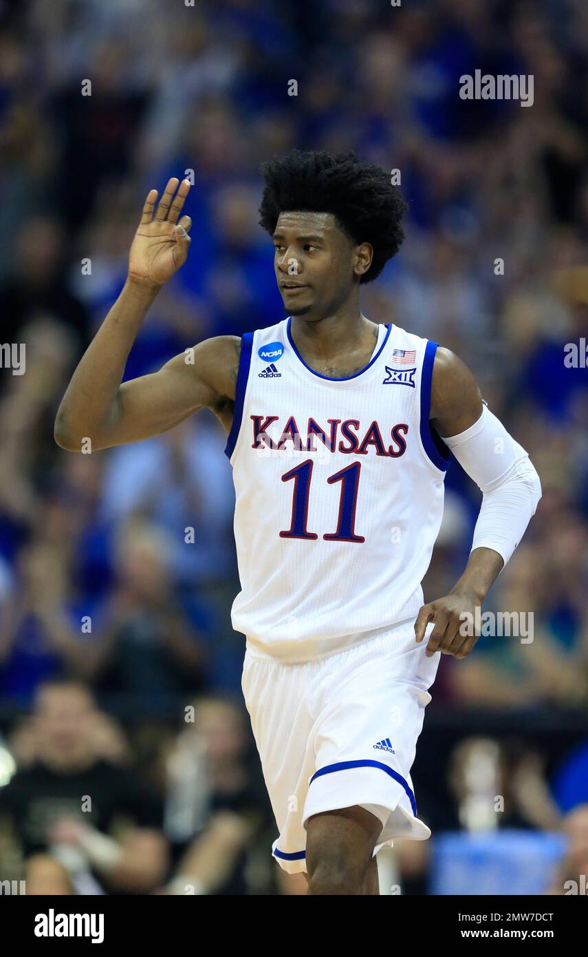 Kansas guard Josh Jackson celebrates after making a 3-point basket ...