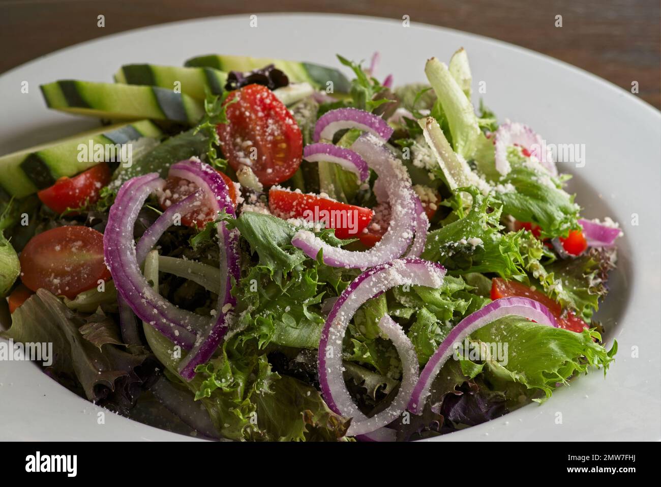 Crisp green salad with crisp lettuce, cucumber, red onion, cherry ...