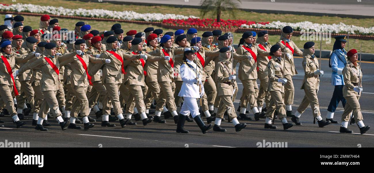 Female Pakistani soldiers march during a military parade to mark ...