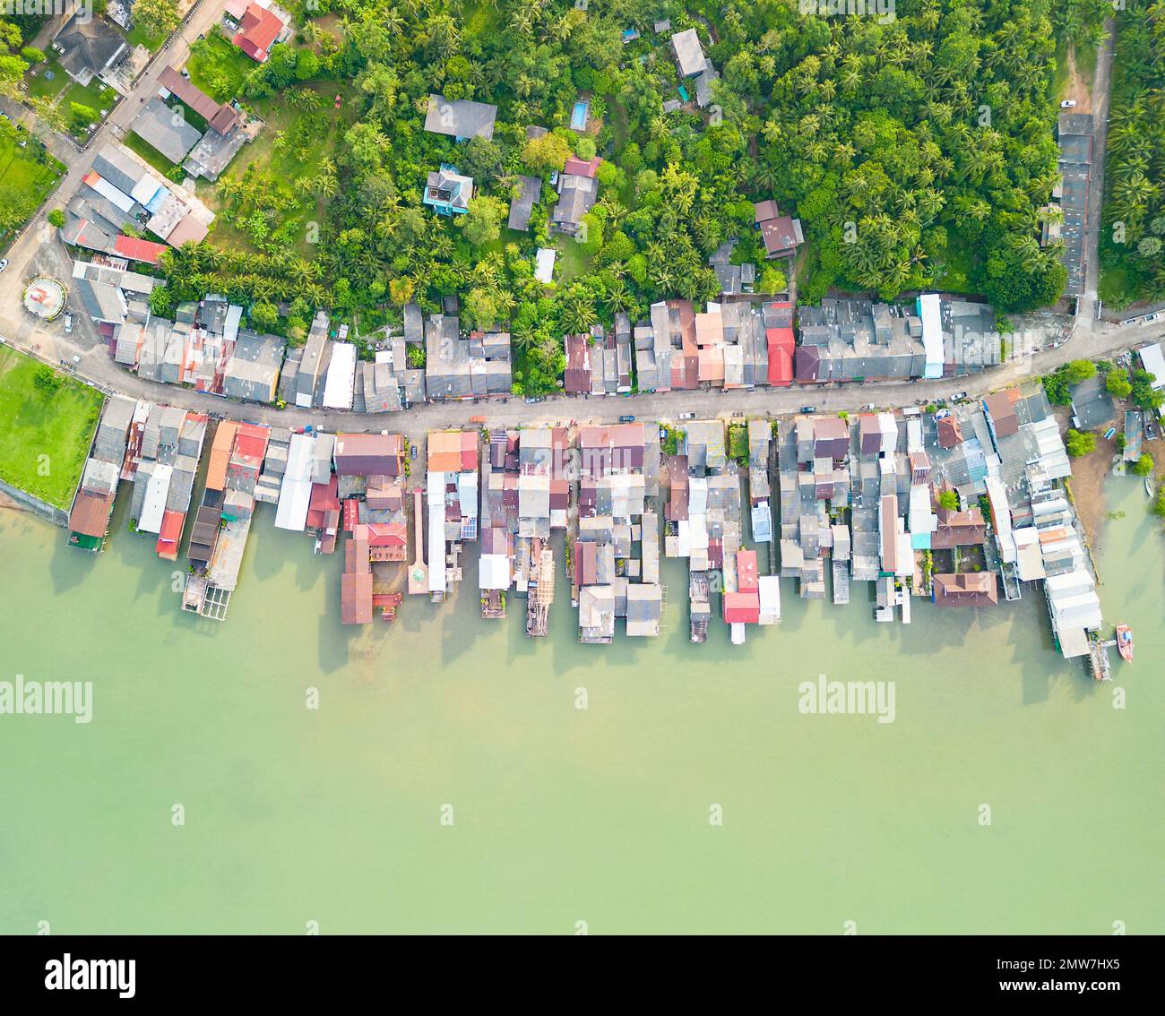 A high-angle shot of the colorful houses on the beach in Koh Lanta ...