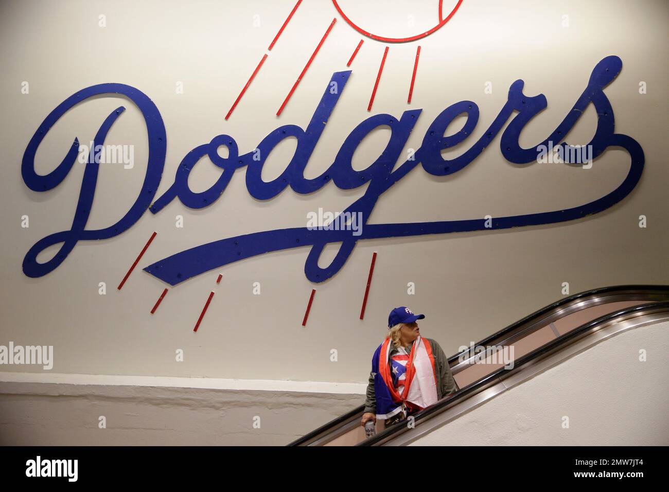 A Puerto Rico fans arrives for the final in the World Baseball Classic ...