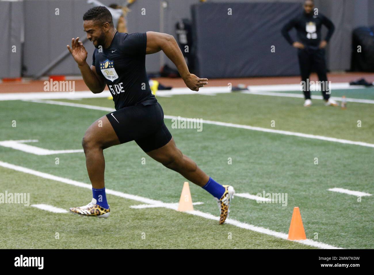 Linebacker Ejuan Price (5) is timed in the 40-yard-dash during ...