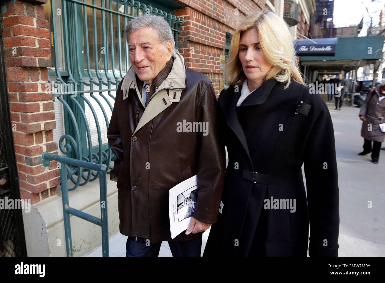 Tony Bennet and his wife Susan Crow leave the funeral for journalist ...
