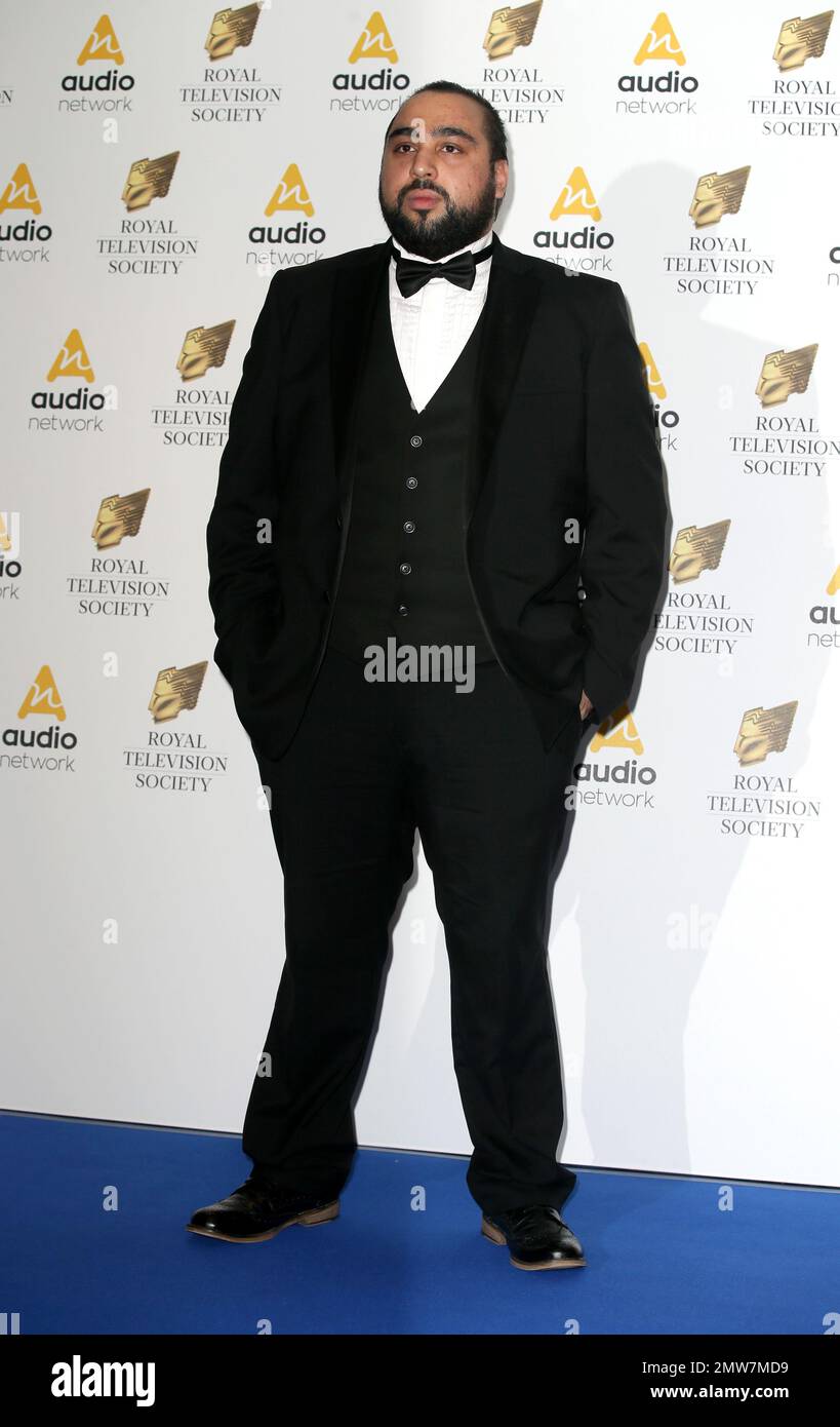 Asim Chaudhry poses for photographers upon arrival at the Royal ...