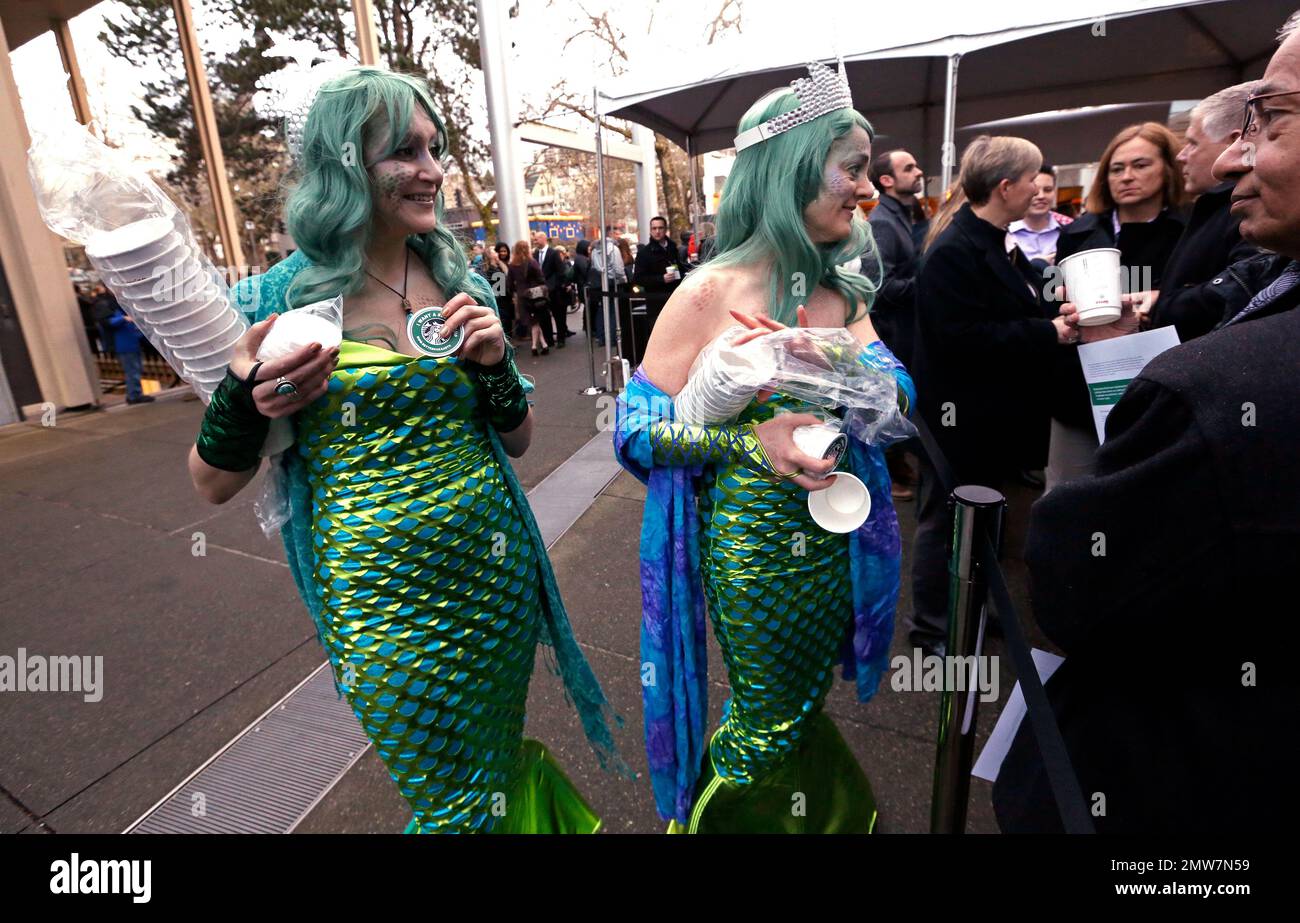 Amy Kenna, left, and Kristen Walsh dress as mermaids as they lobby ...