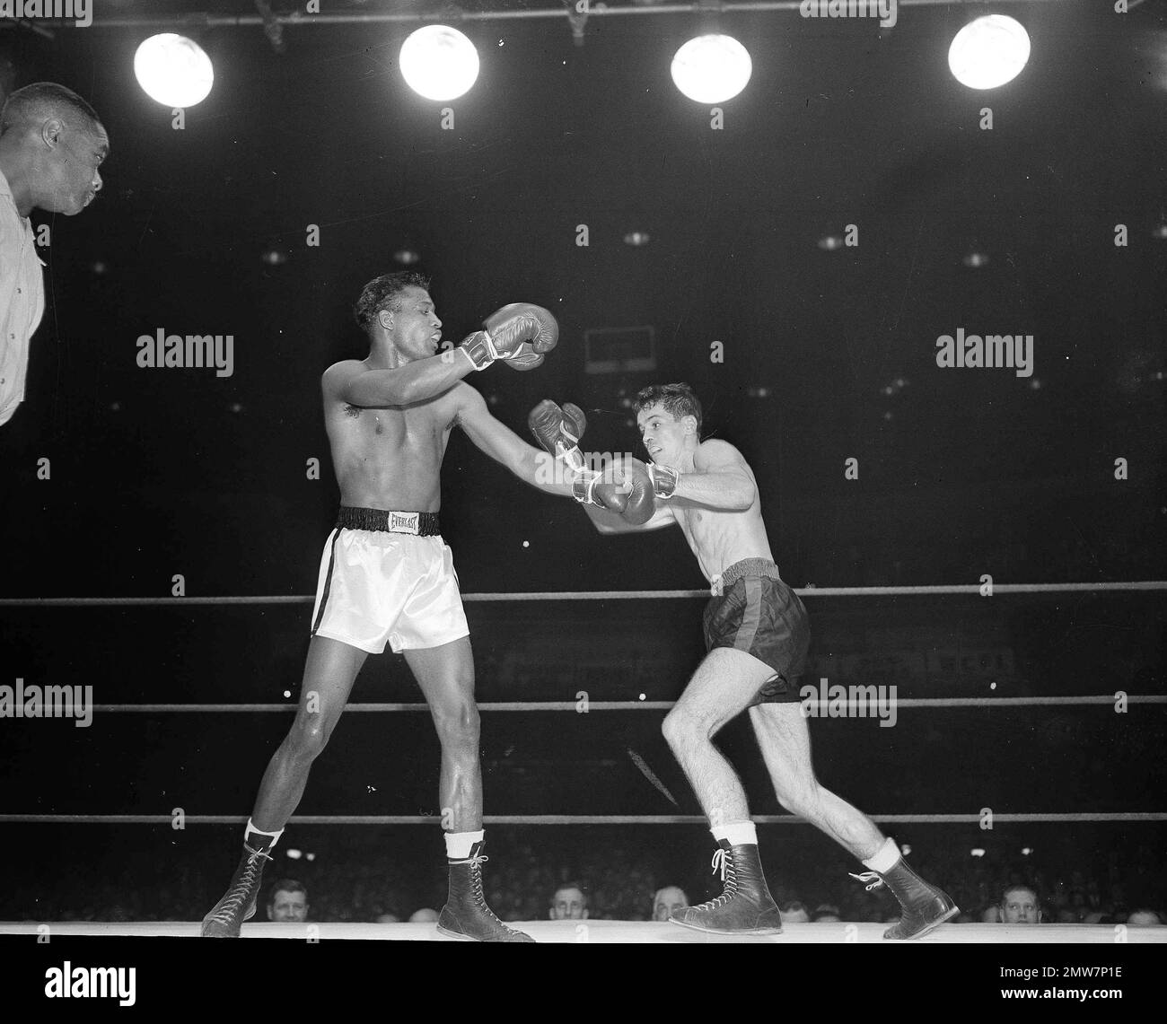Sugar Ray Robinson, left, and Bobby Dykes trade punches in an early ...