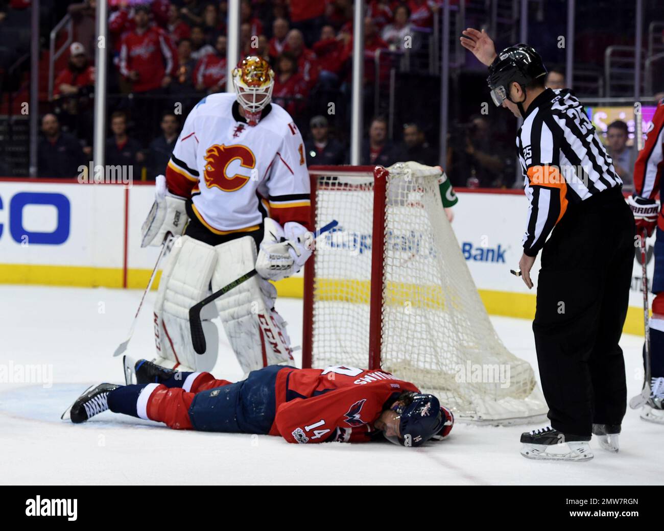 Washington Capitals right wing Justin Williams (14) lies on the ice ...