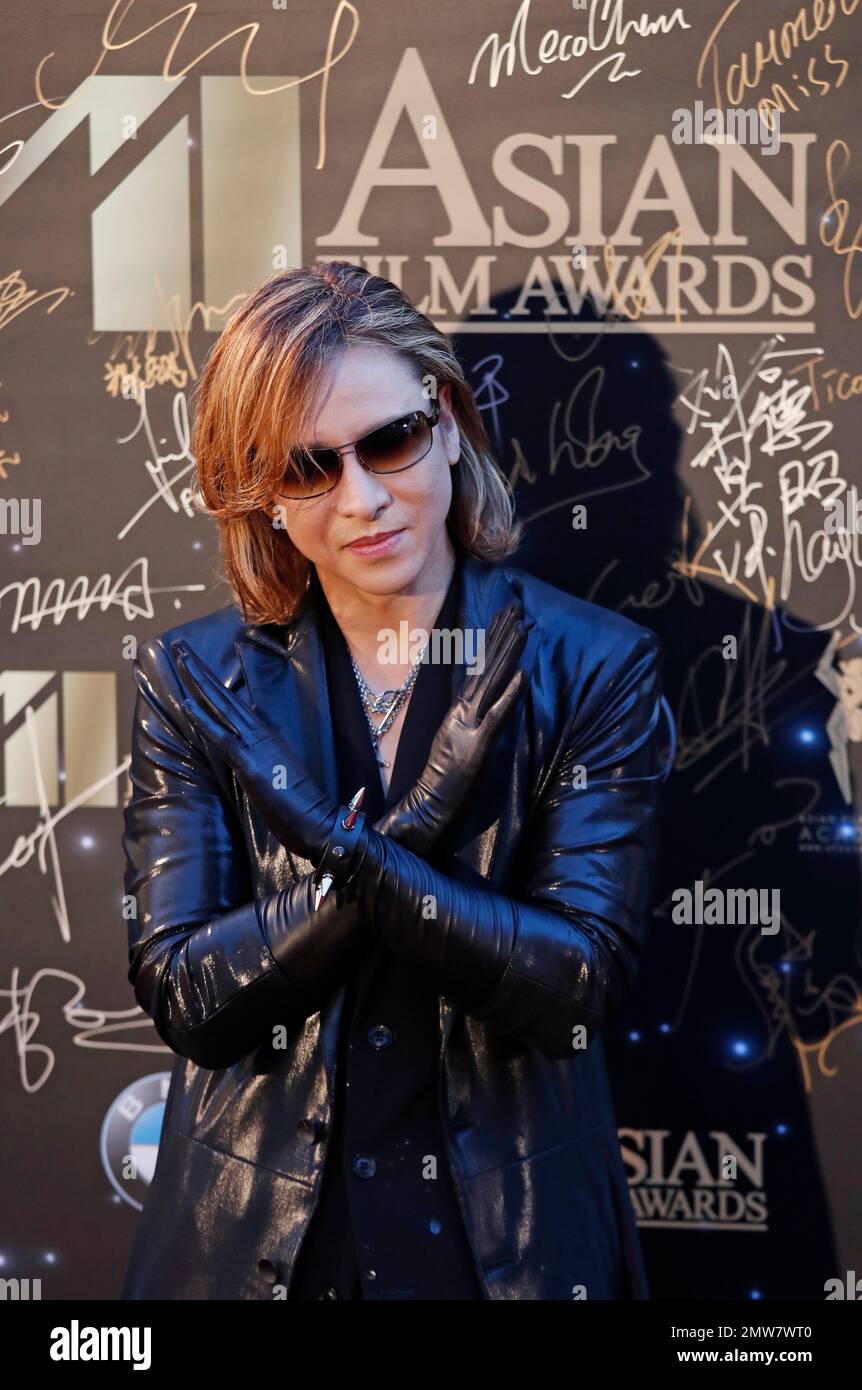 Japanese singer Yoshiki, the leader of X Japan, poses on the red carpet ...