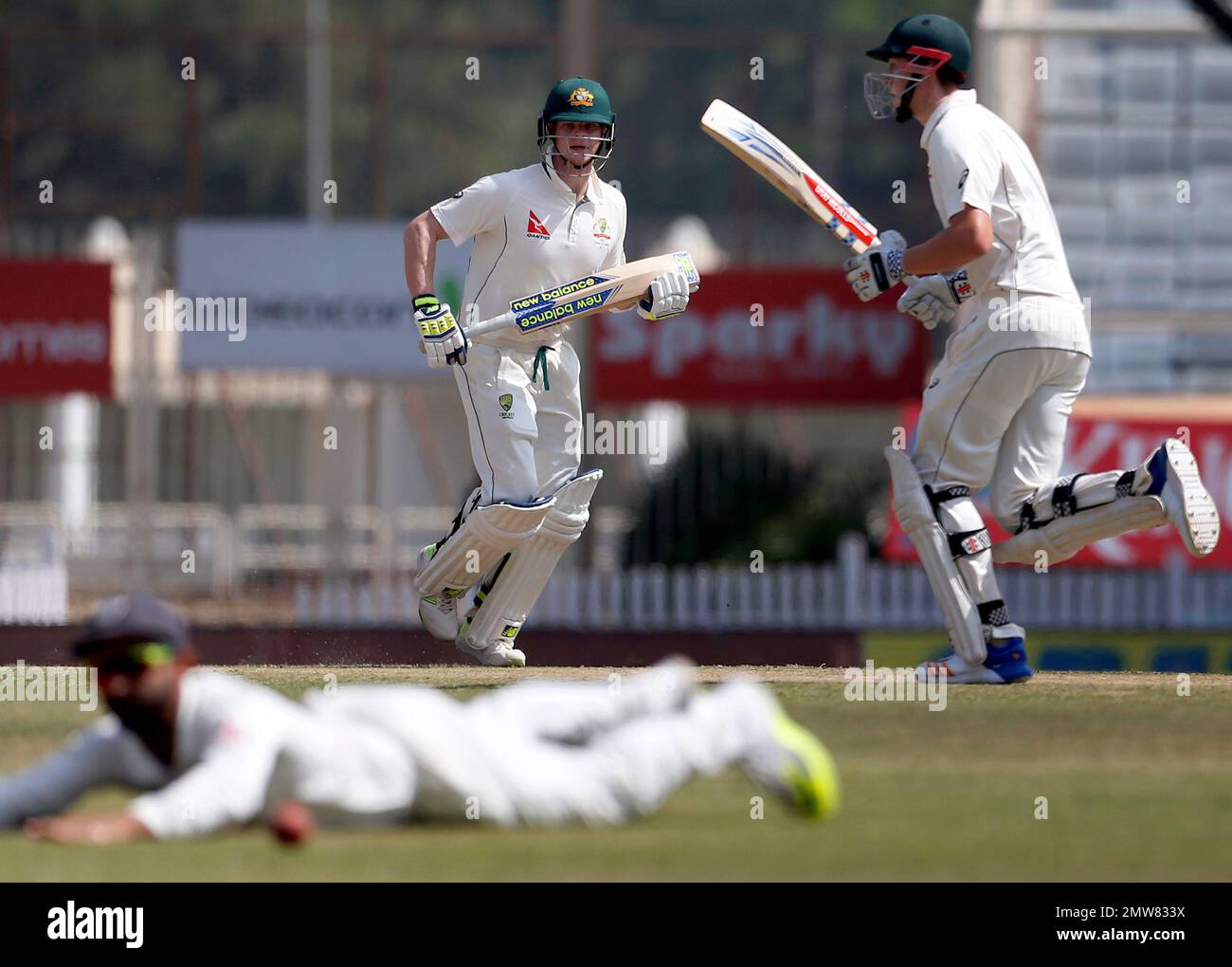 Australia's captain Steven Smith, left, and Matt Renshaw, right, run ...