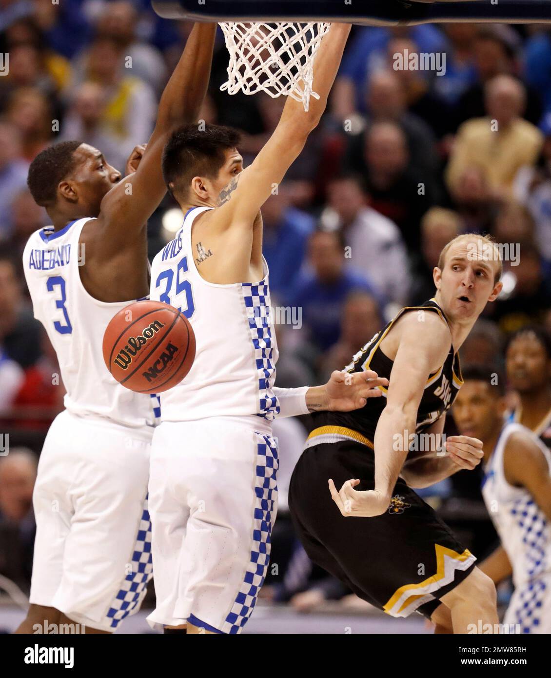 Wichita State's Conner Frankamp, right, passes around Kentucky's Bam ...