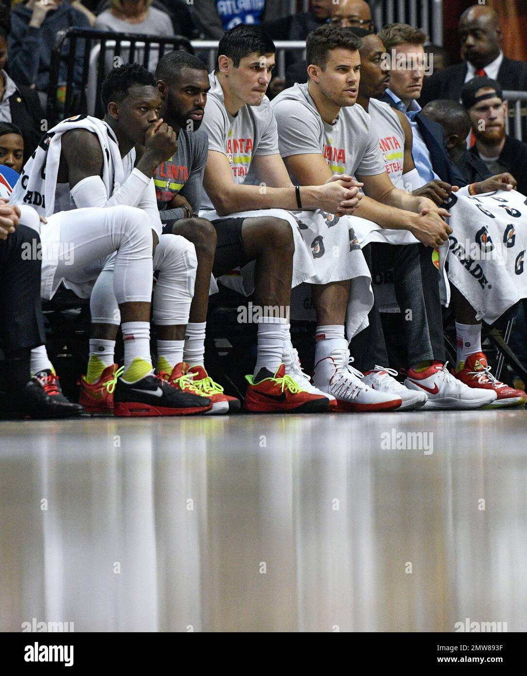 Atlanta Hawks players wait on the bench during the final moments of an ...