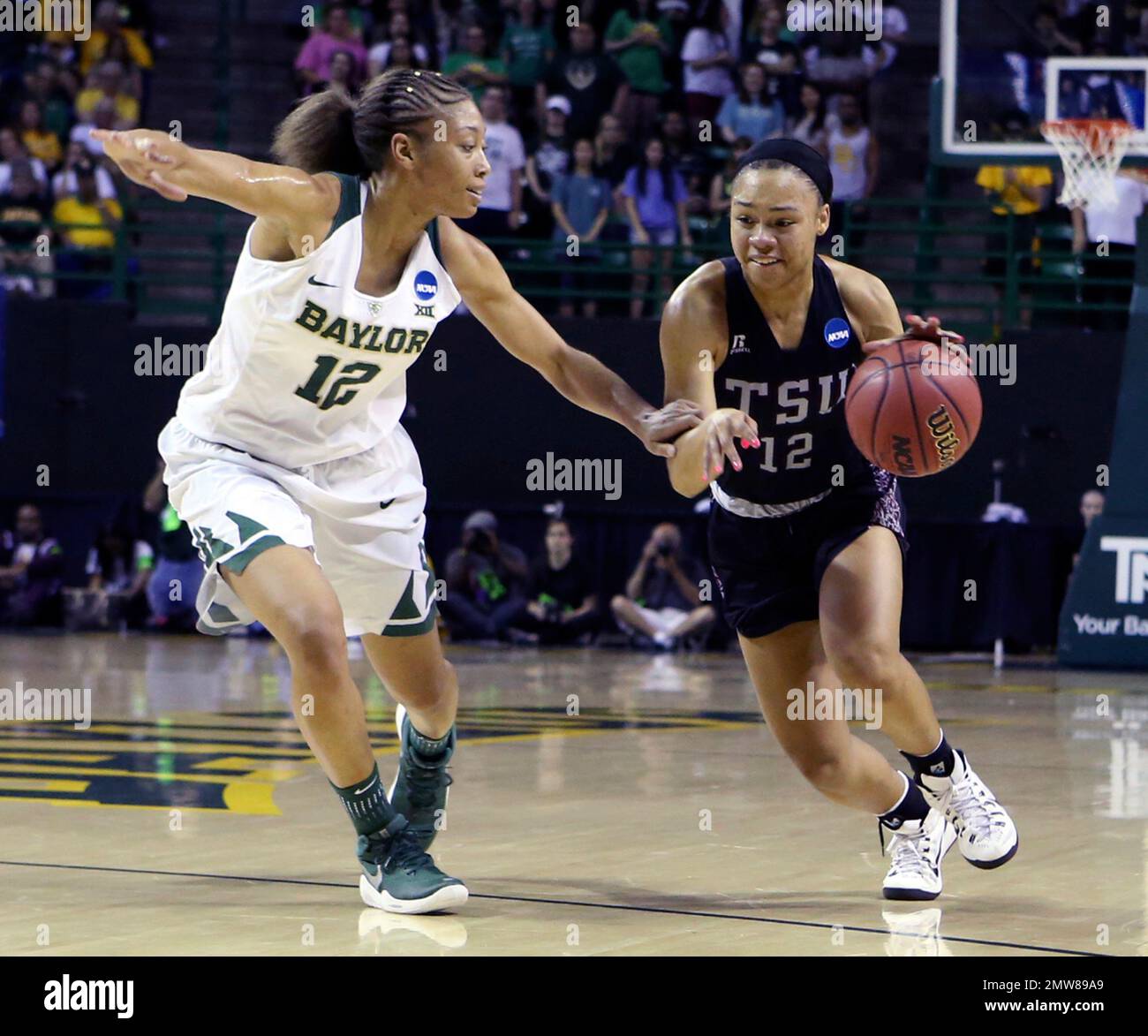 Texas Southern guard Chynna Ewing, right, drives by Baylor guard Alexis ...