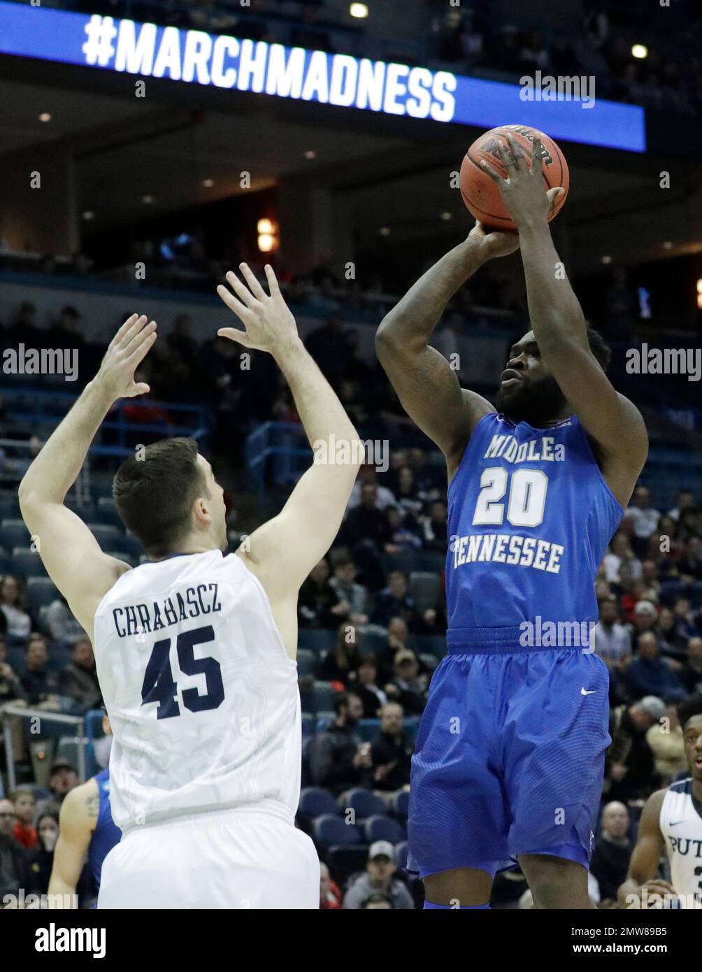 Middle Tennessee State's Giddy Potts shoots over Butler's Andrew ...