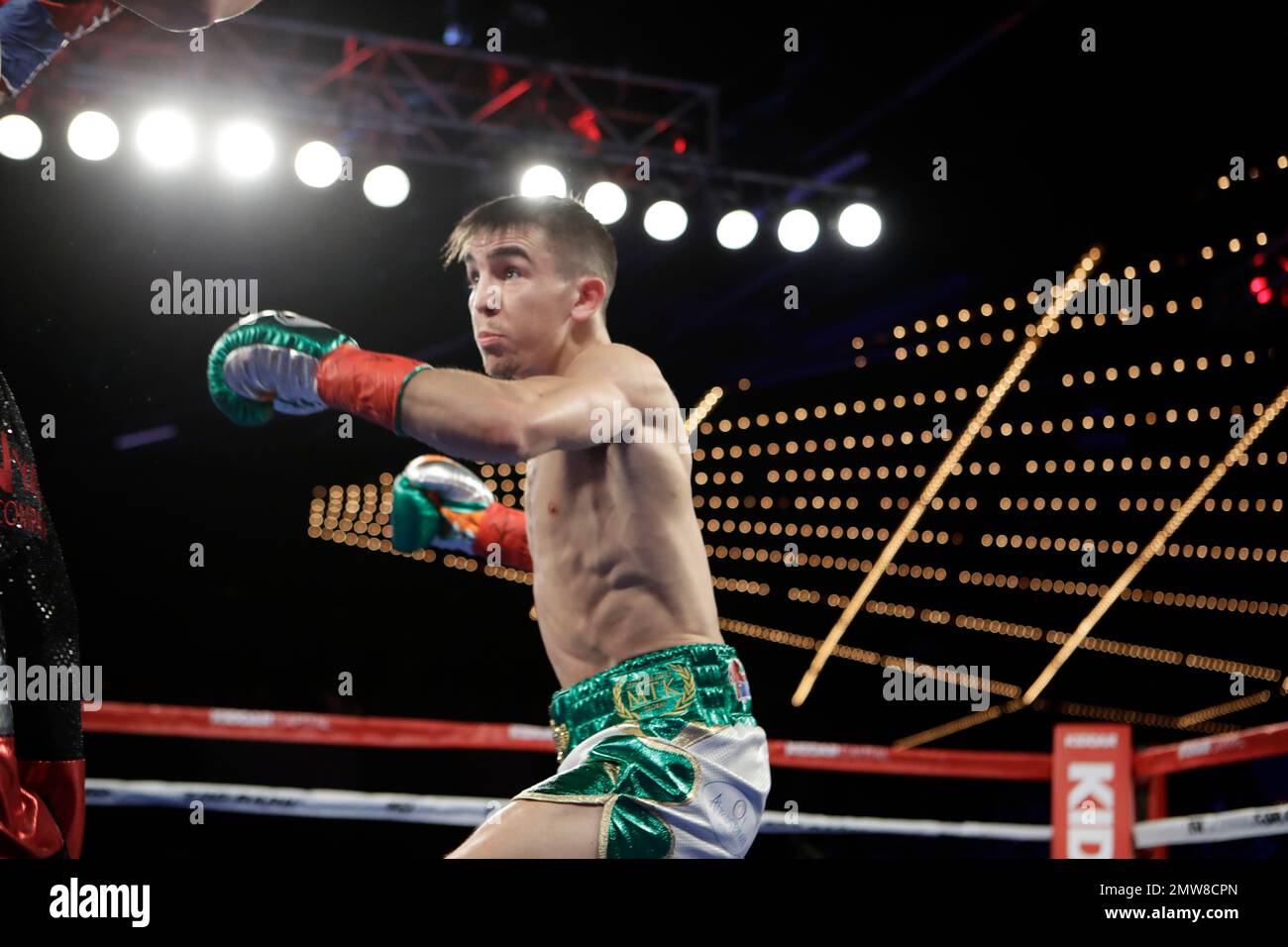 Michael Conlan, of Ireland, fights Tim Ibarra during the first round of ...