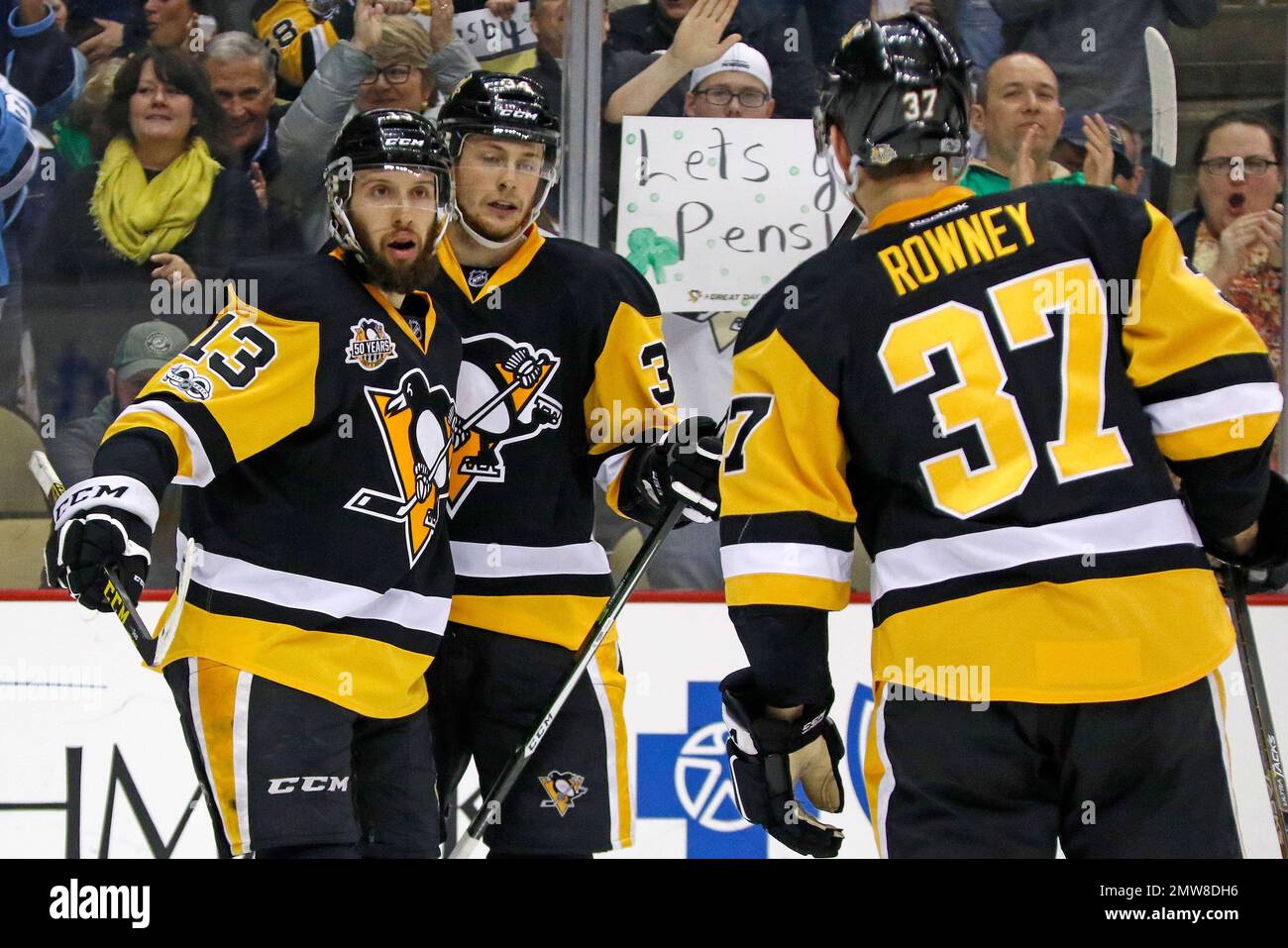 Pittsburgh Penguins' Nick Bonino (13) celebrates his goal with Tom ...