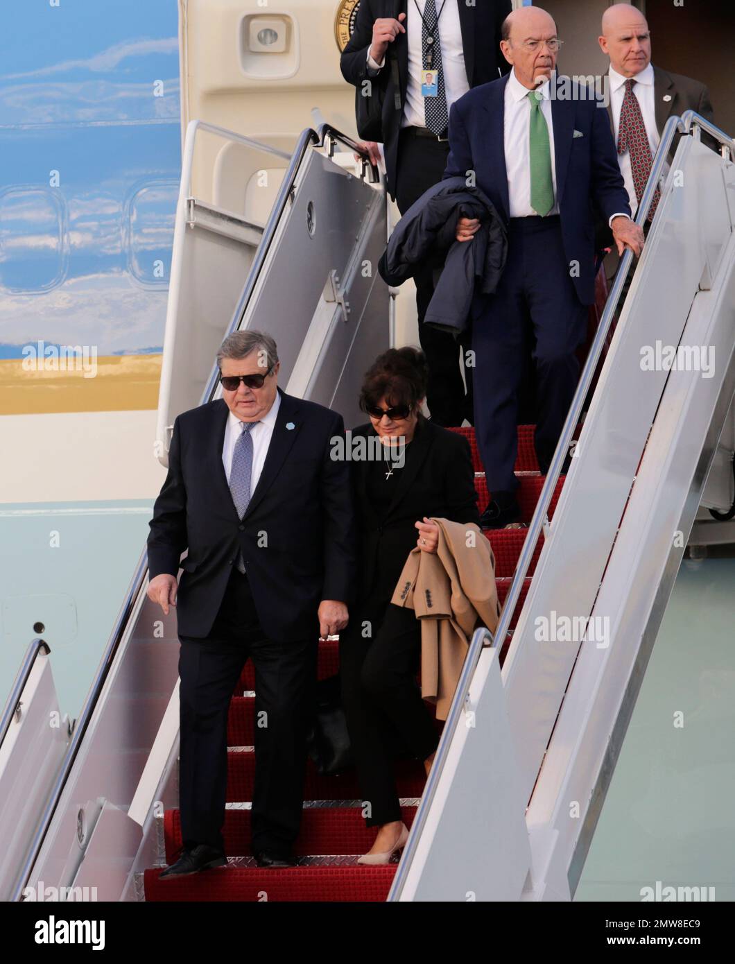 Secretary of Commerce Wilbur Ross, top left, arrives on Air Force One ...