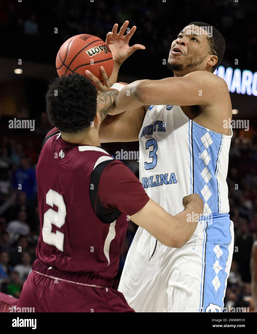 North Carolina's Kennedy Meeks (3) is fouled by Texas Southern's Zach ...
