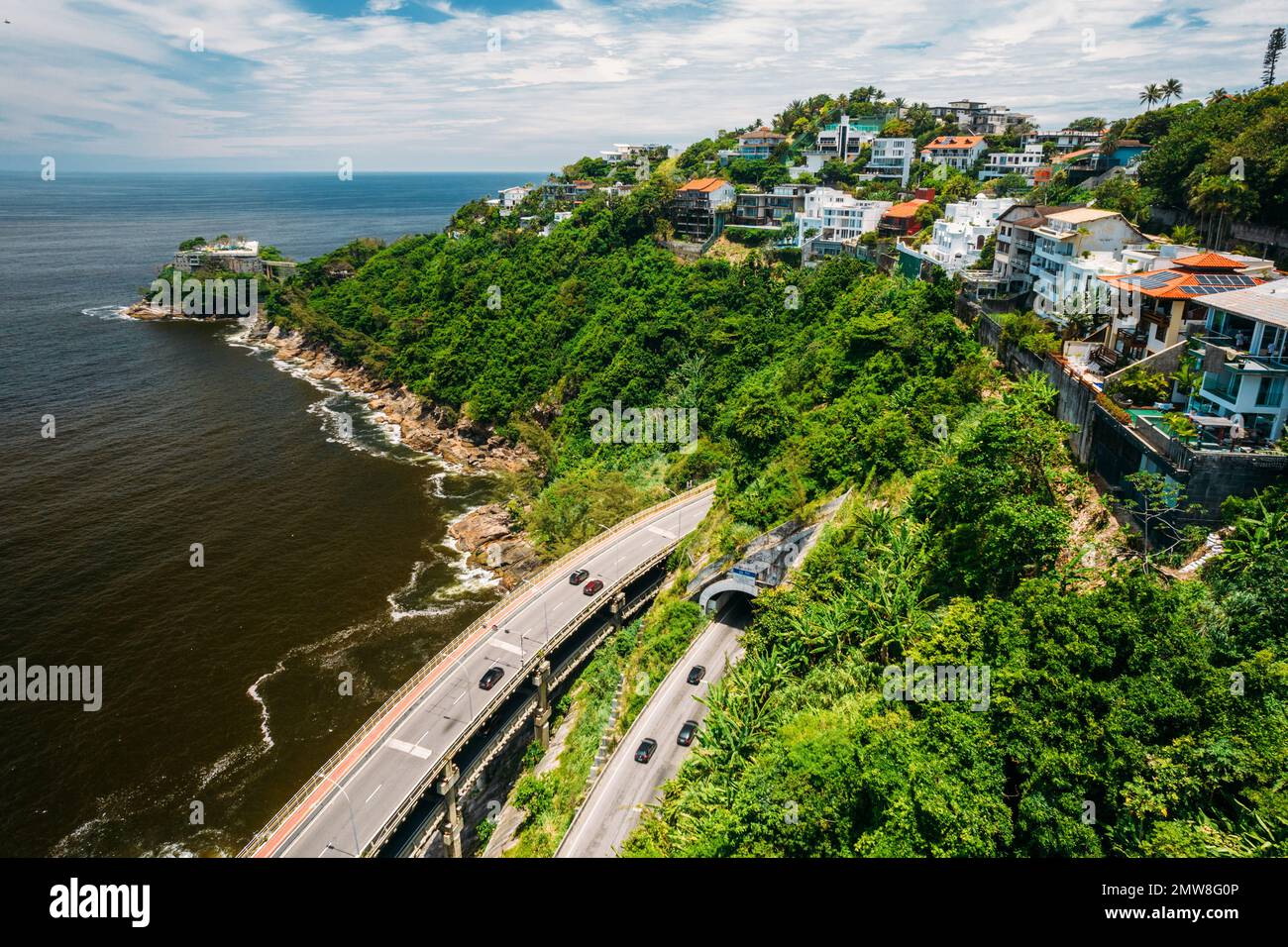 Aerial drone view of luxurious houses overlooking the Elevado do Joa in ...